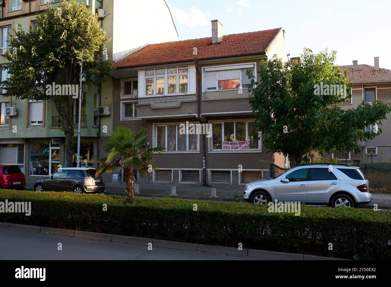 A charming two-story building showcasing classic architecture in a ...