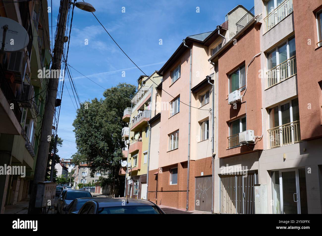 Residential buildings showcase modern architecture in a bustling urban ...