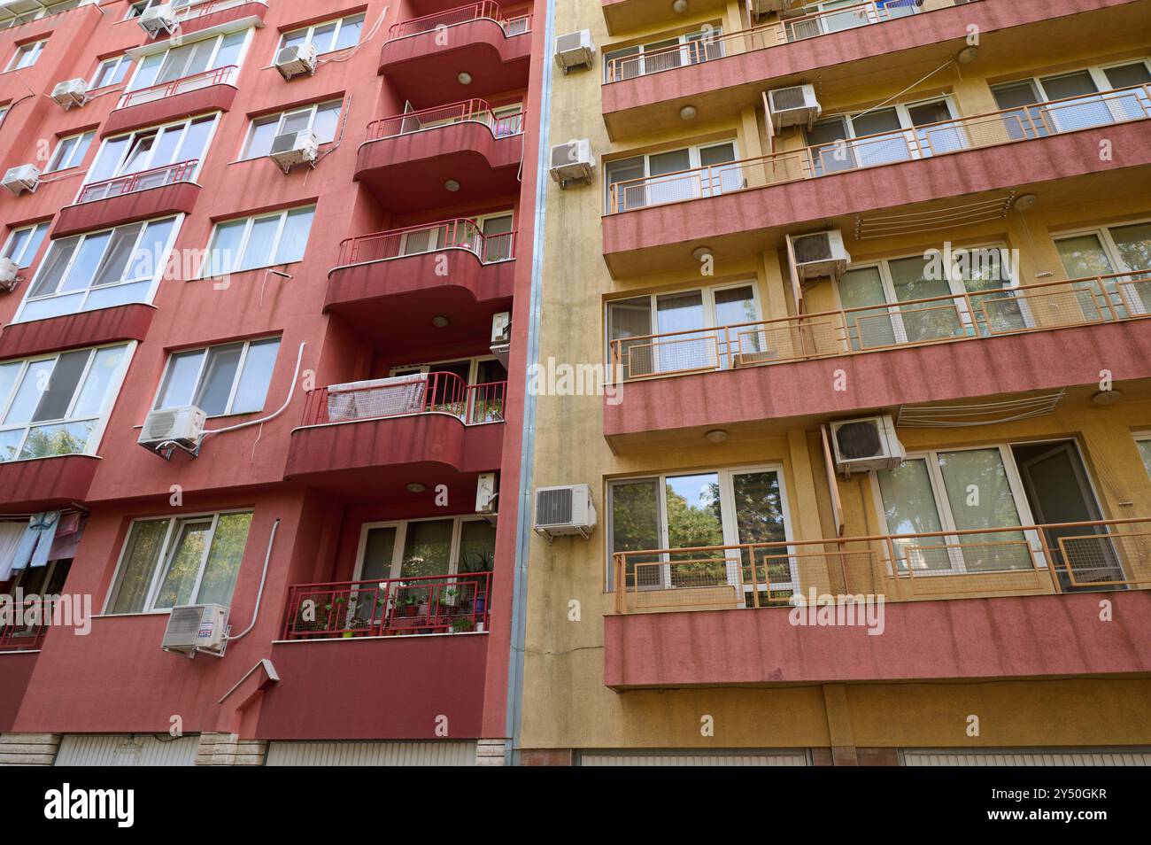 Two distinct architectural styles of modern apartment buildings in an ...