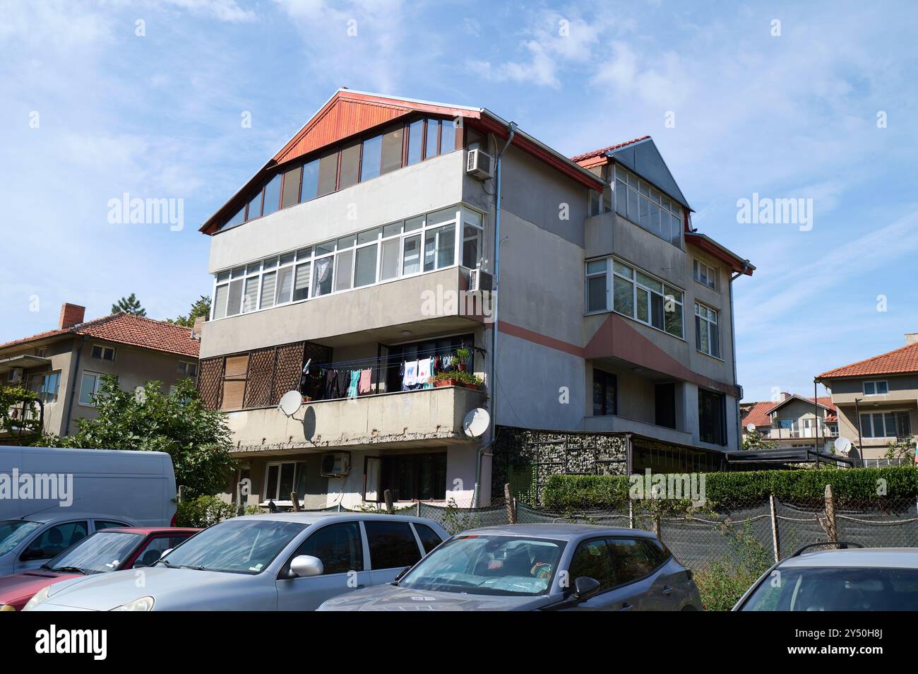 Modern residential building with unique architecture in a suburban area ...
