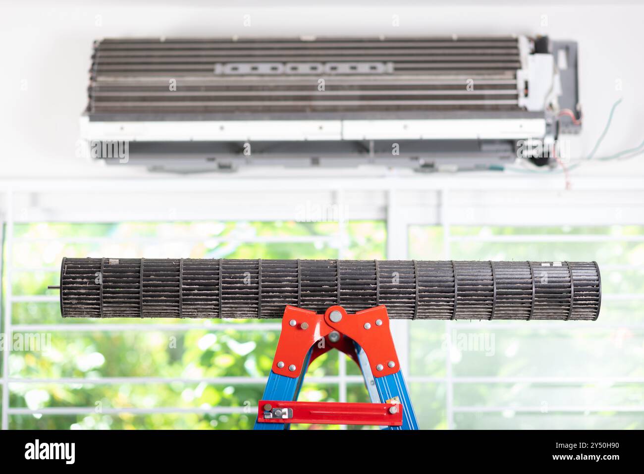 Close up dirty on air conditioner blower fan. Maintaining the air ...