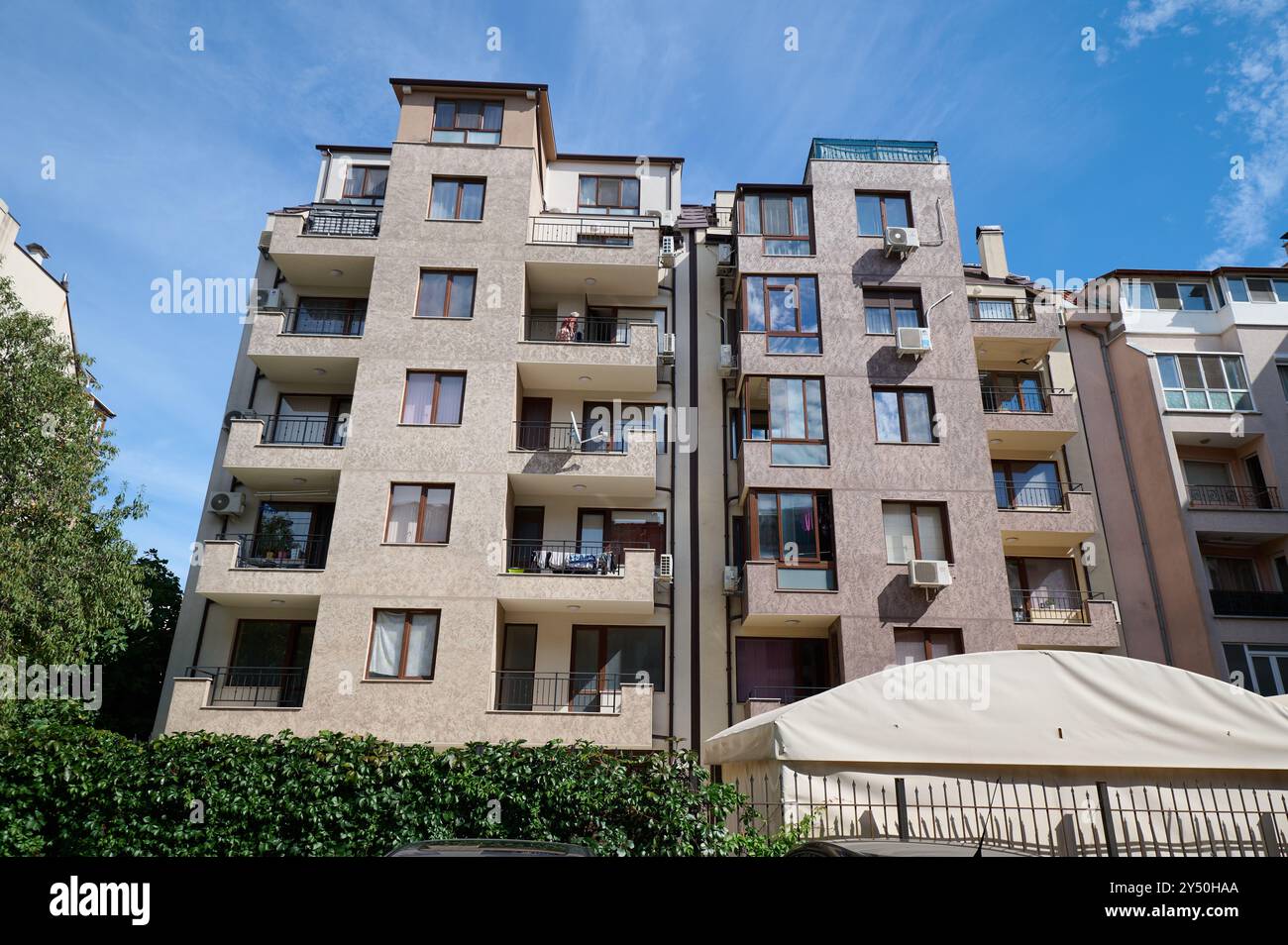 A modern residential building features a unique architectural design ...