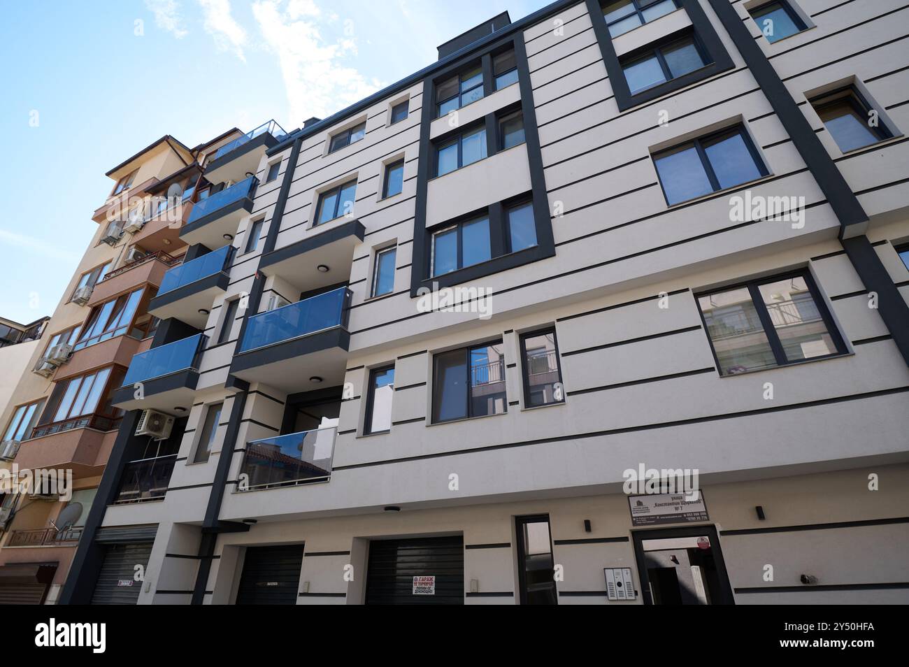 Modern architectural design of a five-story residential building in an ...