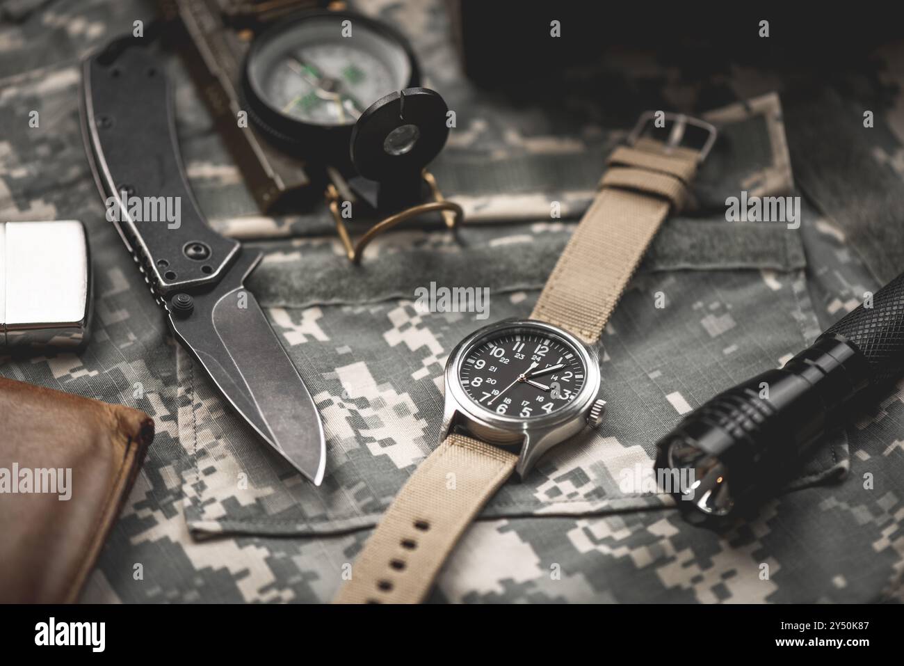 Close up black dial military style wristwatch with biege nylon watch ...