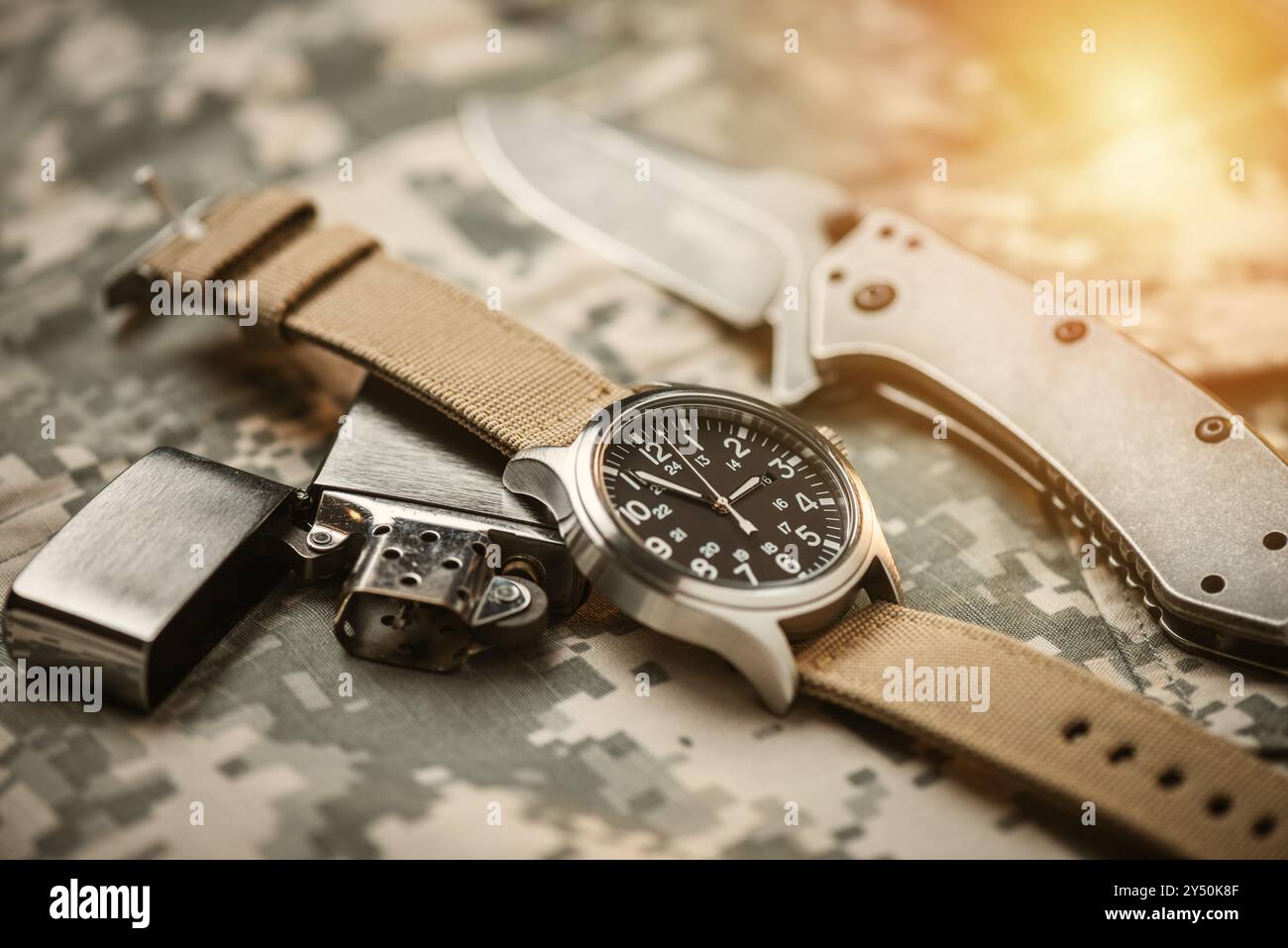 Close up black dial military style wristwatch with biege nylon watch ...