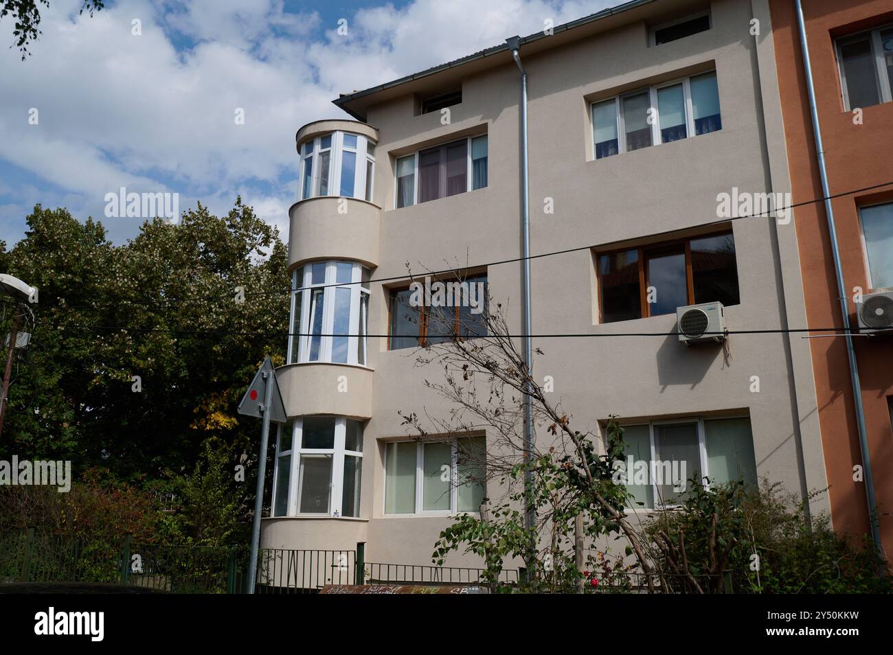 Modern architectural design of a residential building featuring curved ...