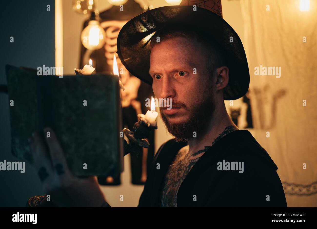 Scary face man with horror Make up holding Pumpkin head jack lantern on ...