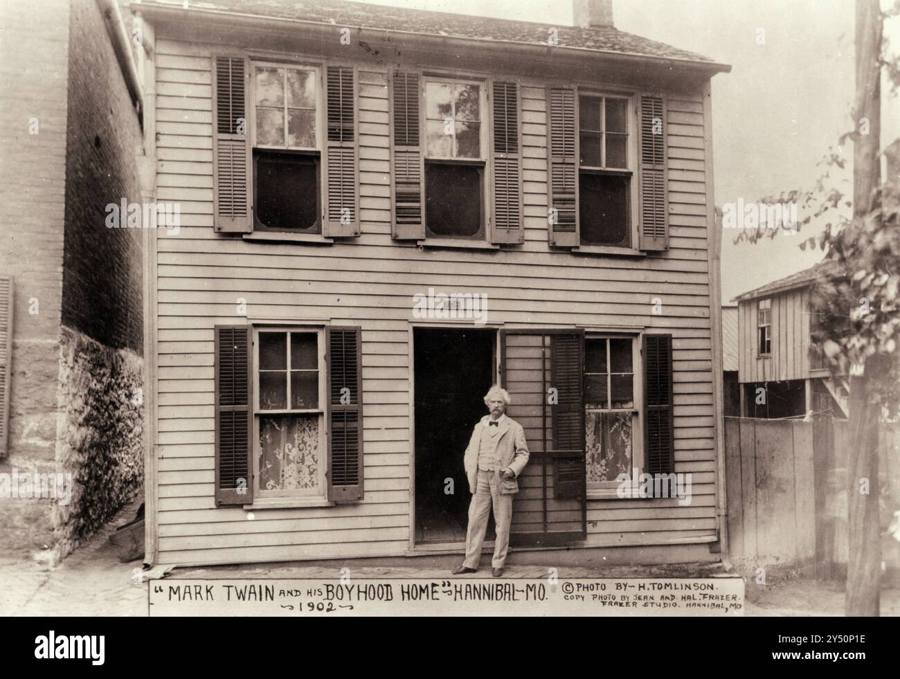 Mark Twain in front of boyhood home in Hannibal, 1902 - photo by H ...