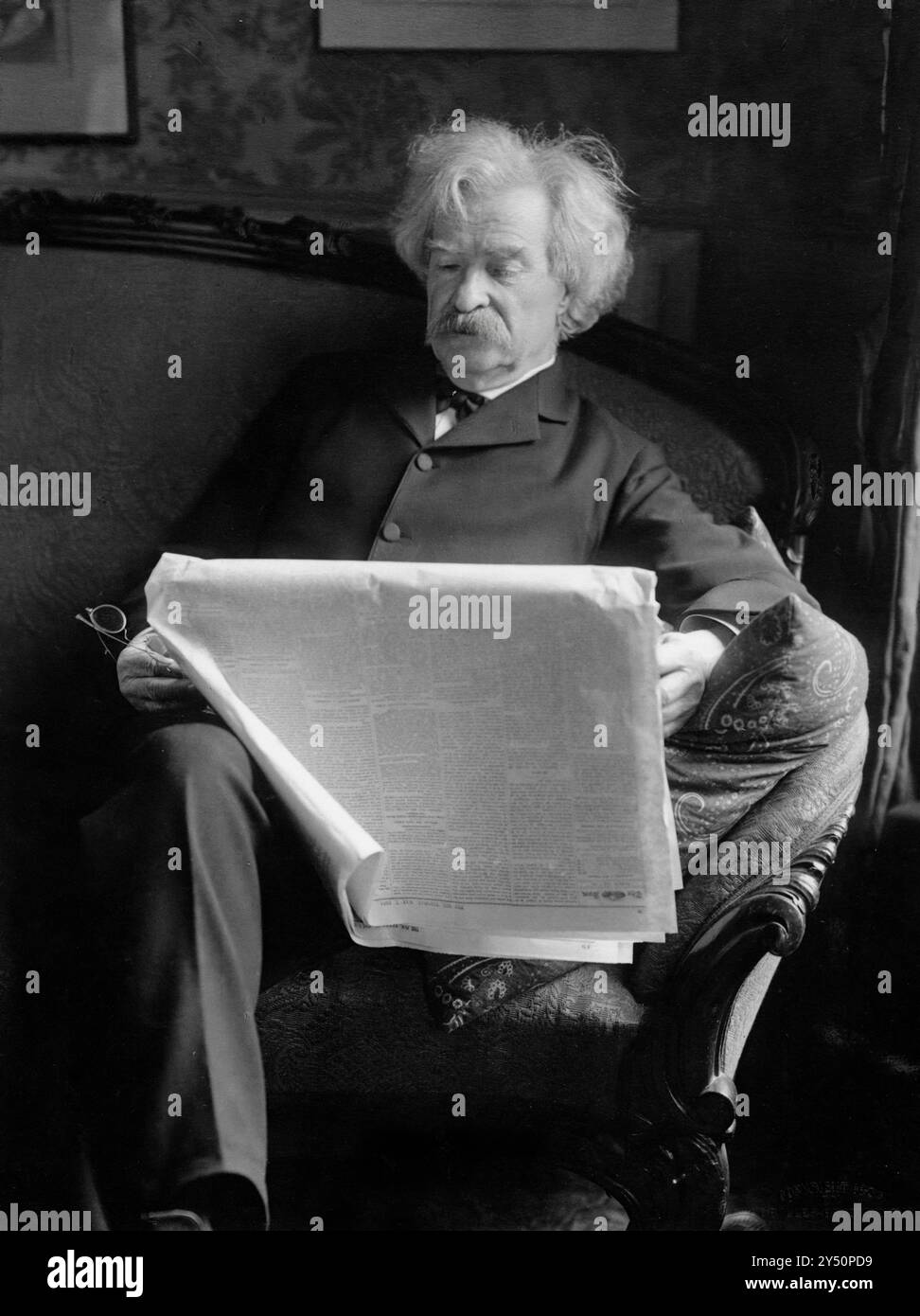 Portrait of Mark Twain reading a newspaper, 1902 - Bolles, Charles E ...
