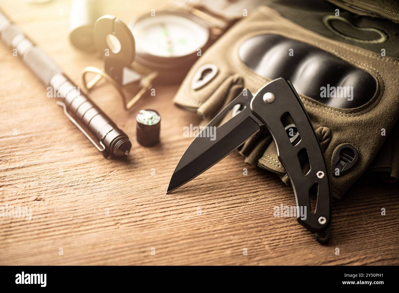 Tactical objects, military equipments. selective focus on folding knife ...