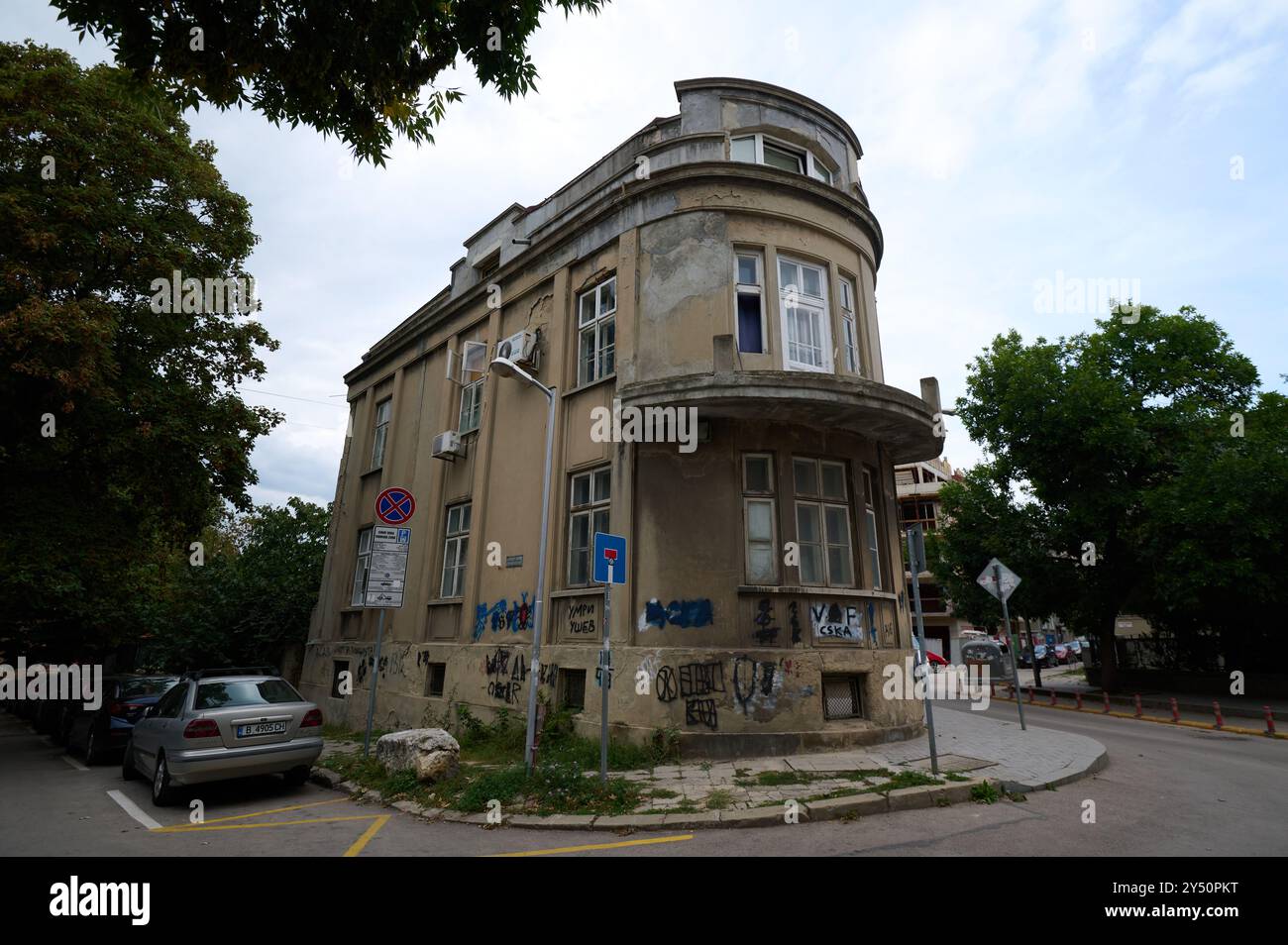 Historic building featuring unique architectural style and urban street ...