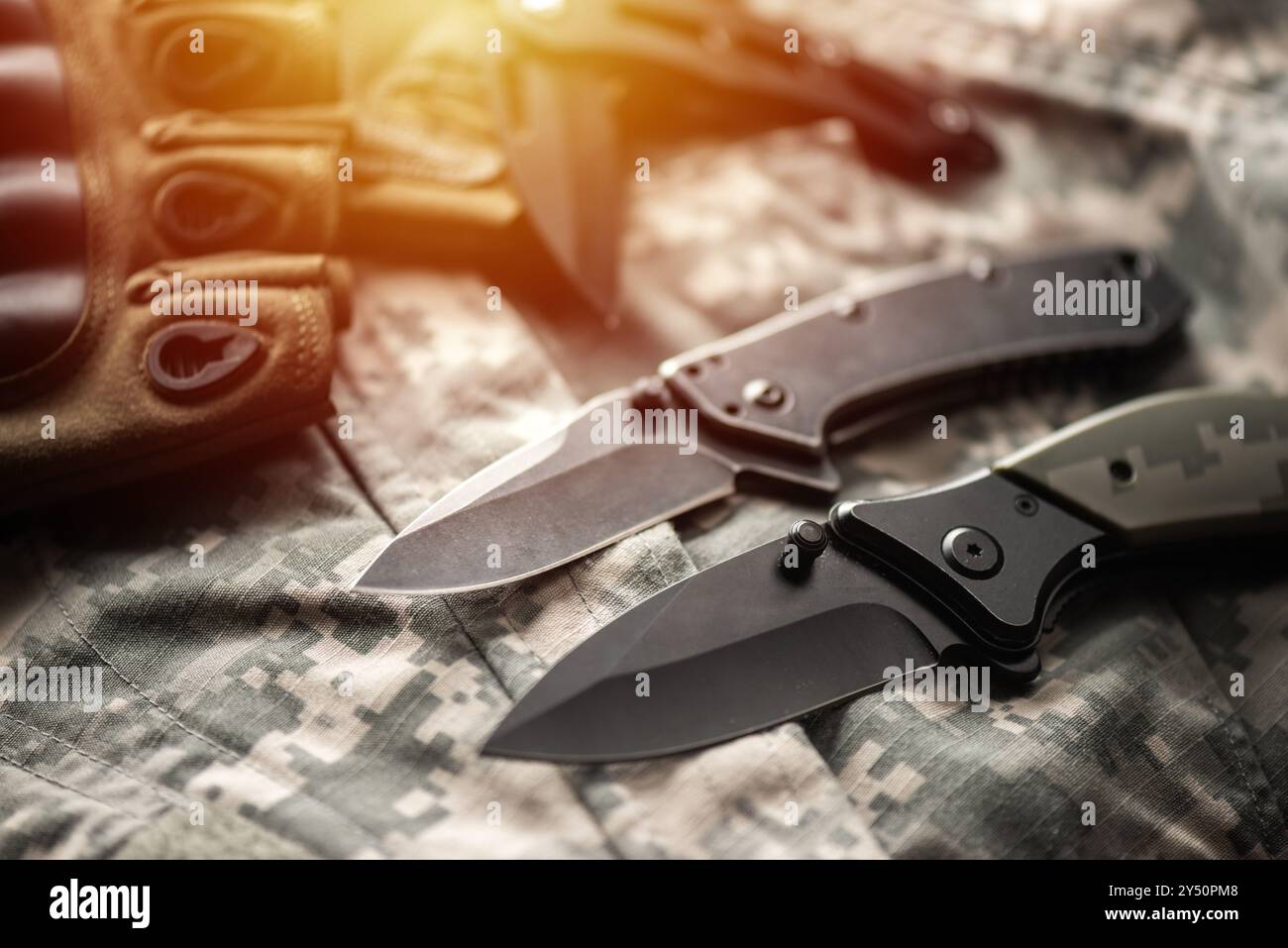 Tactical objects, military equipments. selective focus on folding knife ...