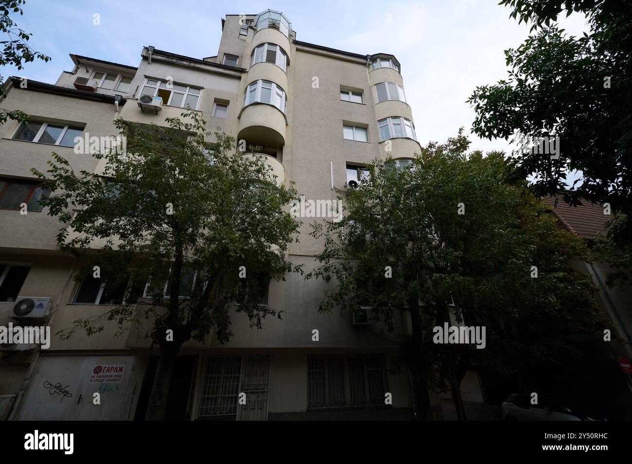 Modern architectural building adorned with large windows in a city ...