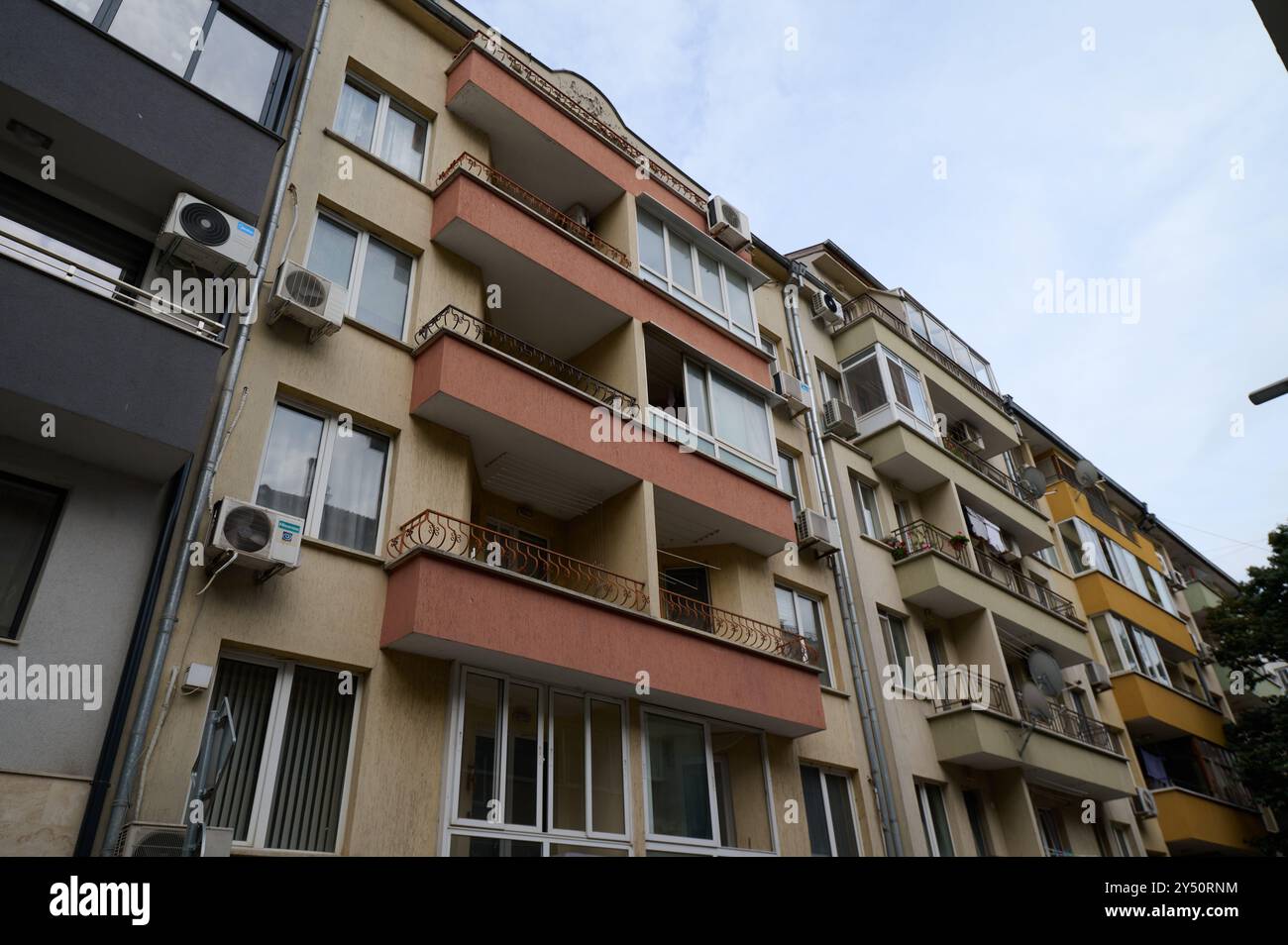 Modern apartment building featuring a blend of architecture styles in ...