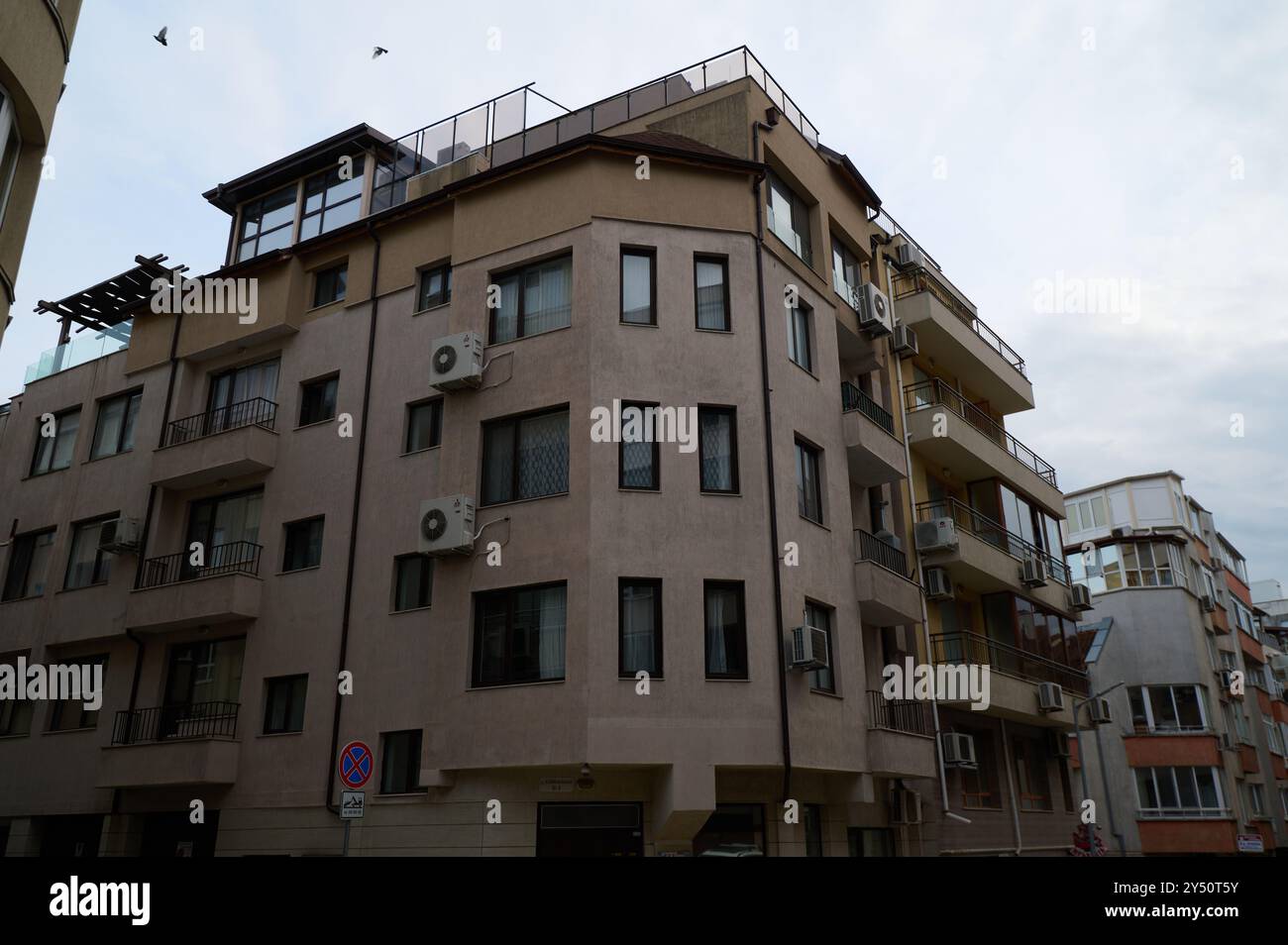 Stylish modern apartment building featuring unique architectural design ...