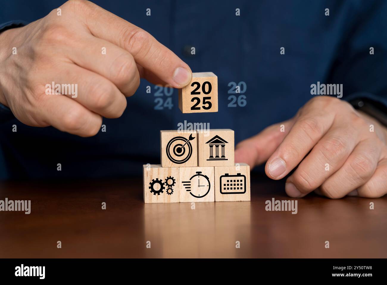 2025 growth business. Wooden block with 2025 icon. Set up objective ...