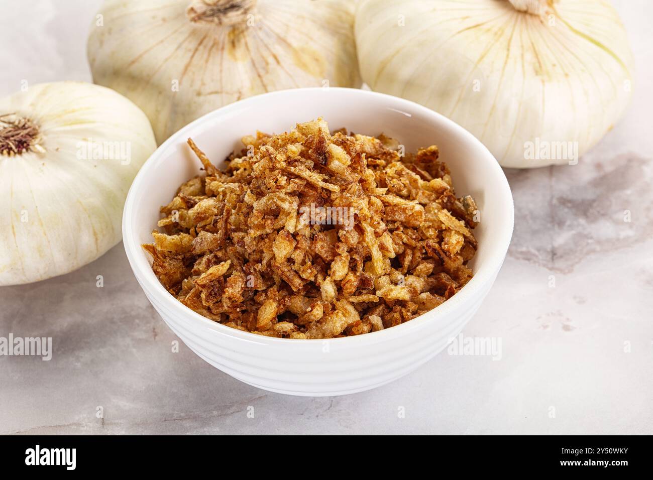 Dried roasted onion crunchy flakes for culinary Stock Photo - Alamy