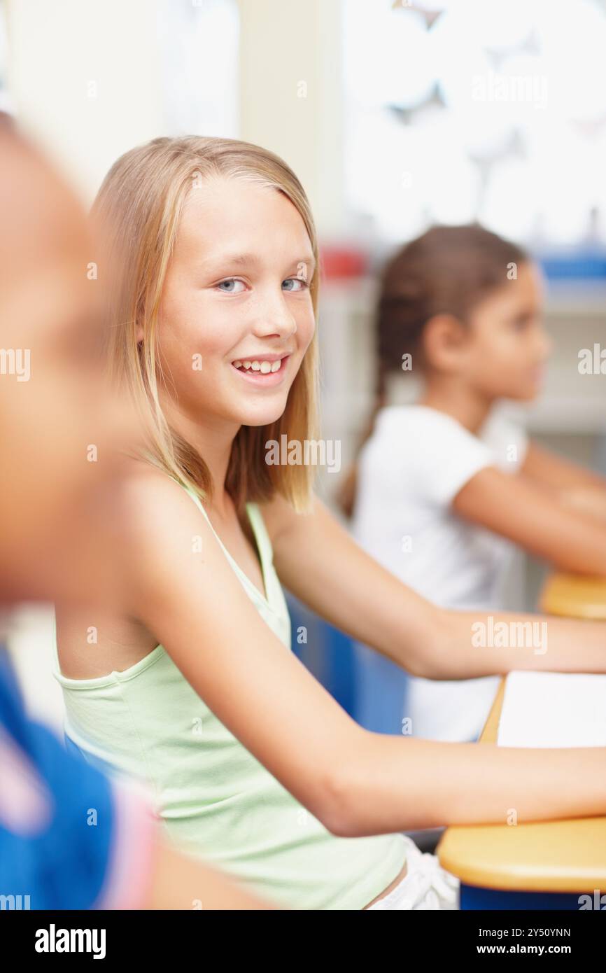 Smile, portrait and girl in class for lesson, growth and child ...