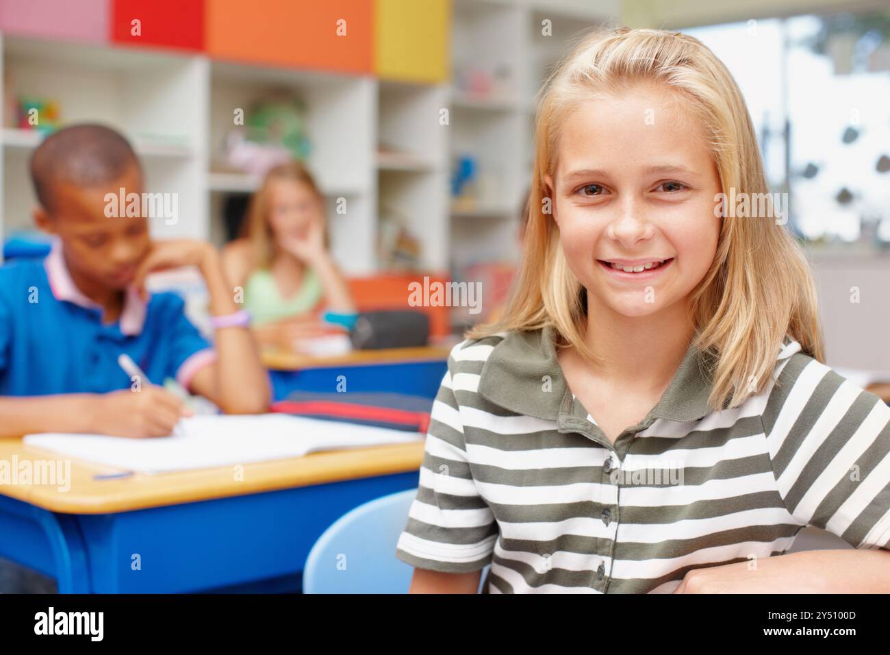 Smile, confidence and portrait of girl in classroom for learning ...