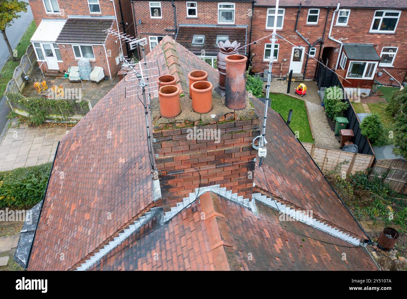 Aerial photo of a typical British terrace house in the UK showing the ...