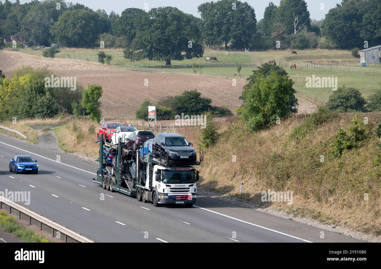 BCA Automotive car transporter on the M40 motorway, Warwickshire, UK ...