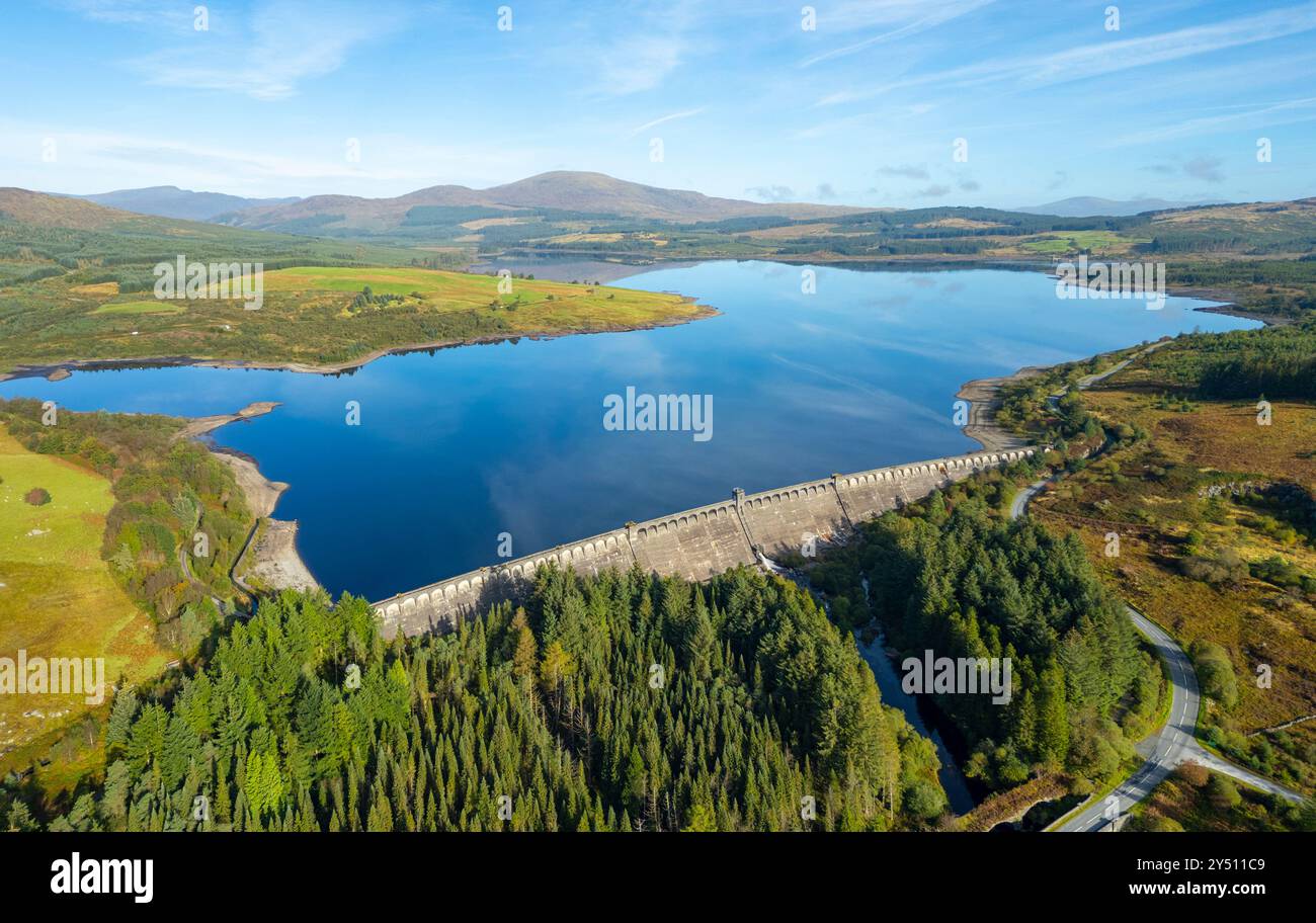 Aerial view from drone of dam on Clatteringshaws Reservoir ( loch) in ...