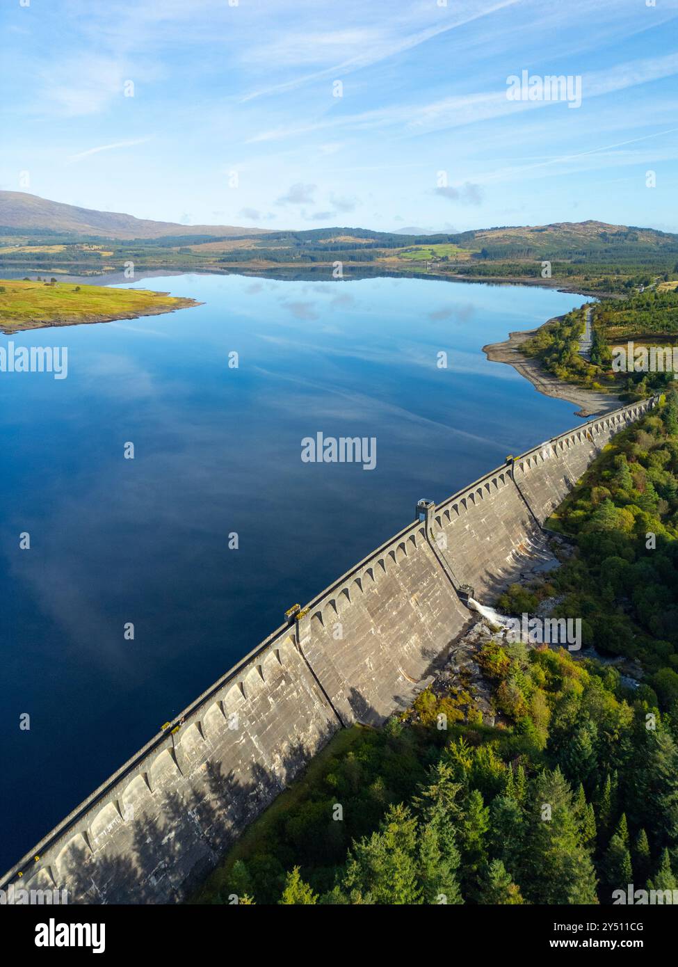 Aerial view from drone of dam on Clatteringshaws Reservoir ( loch) in ...