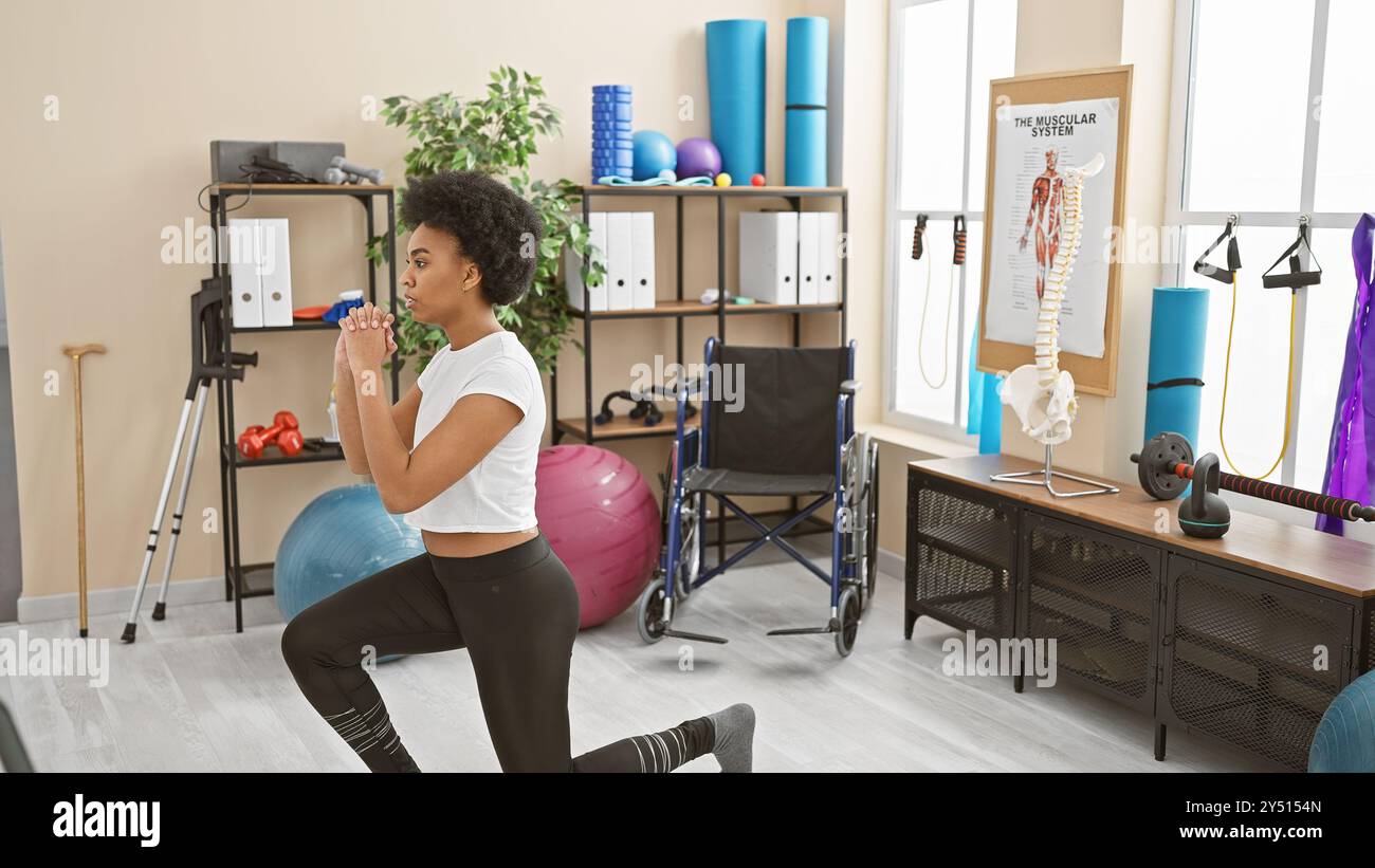 African american woman exercising in a gym, reflecting a healthy ...