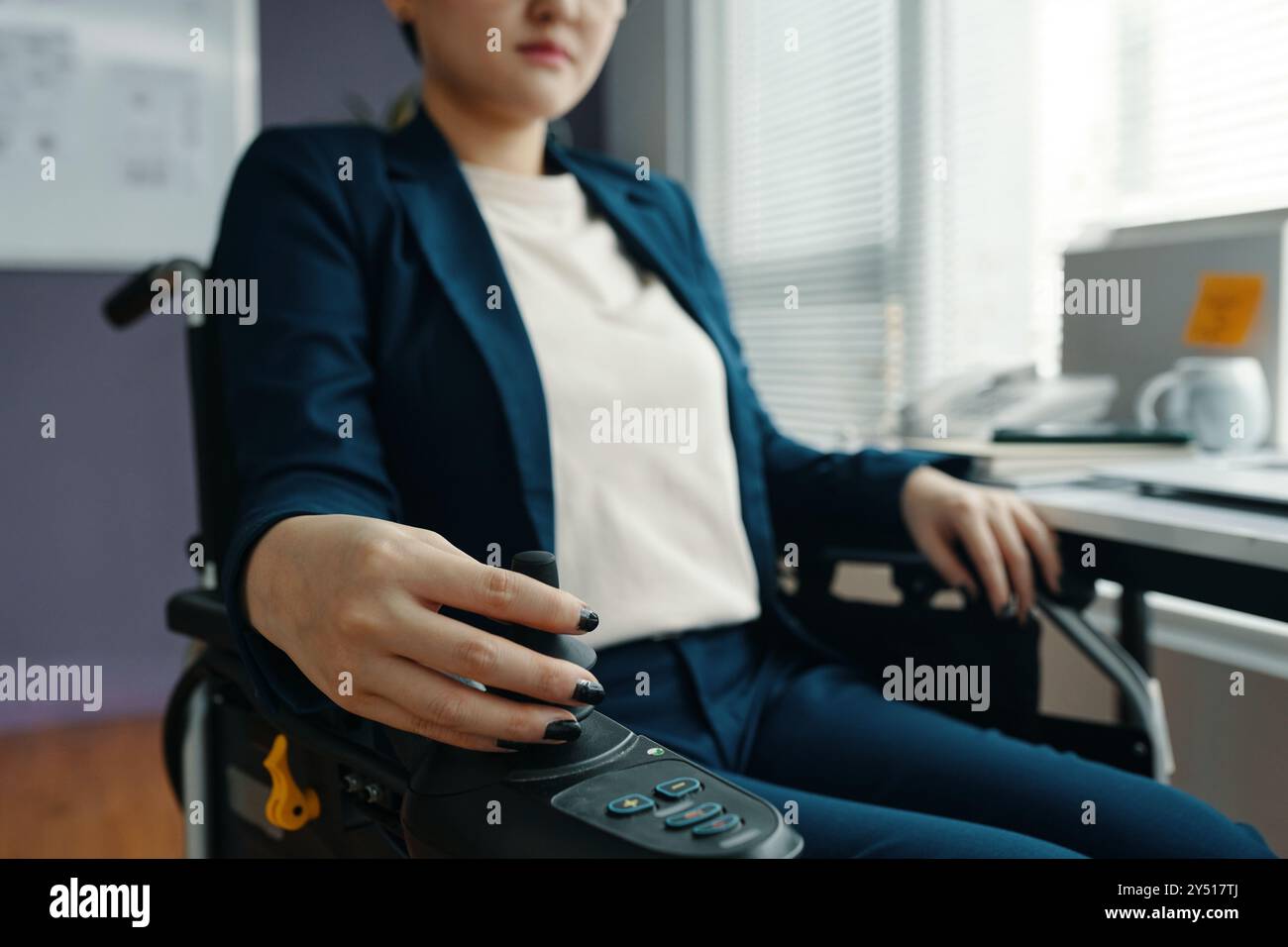 Woman With Disability Using Modern Wheelchair Stock Photo - Alamy