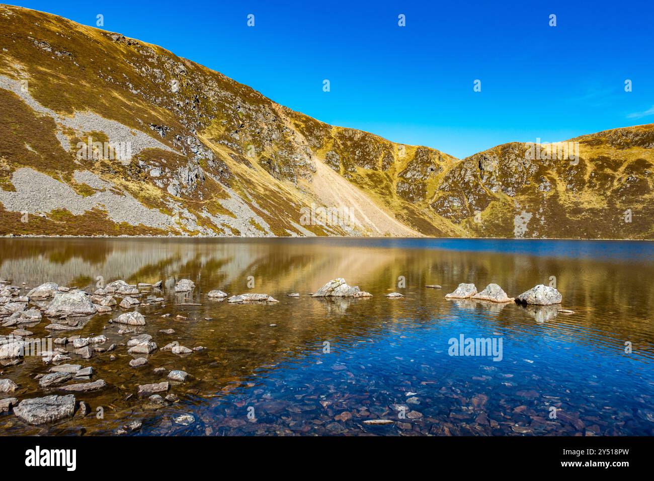 The stunning body of water called Loch Brandy, a mountain loch in Glen ...