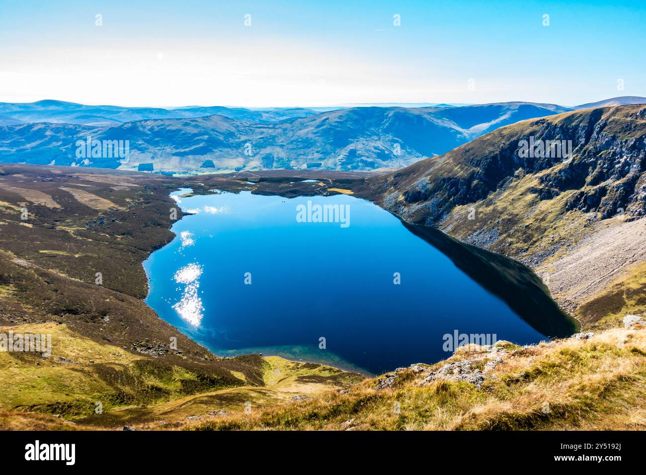 The stunning body of water called Loch Brandy, a mountain loch in Glen ...
