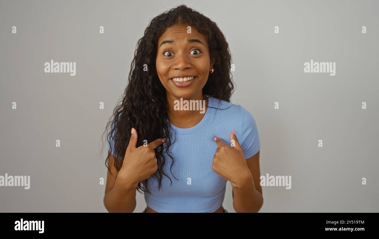 Young woman reacting surprised hi-res stock photography and images - Alamy