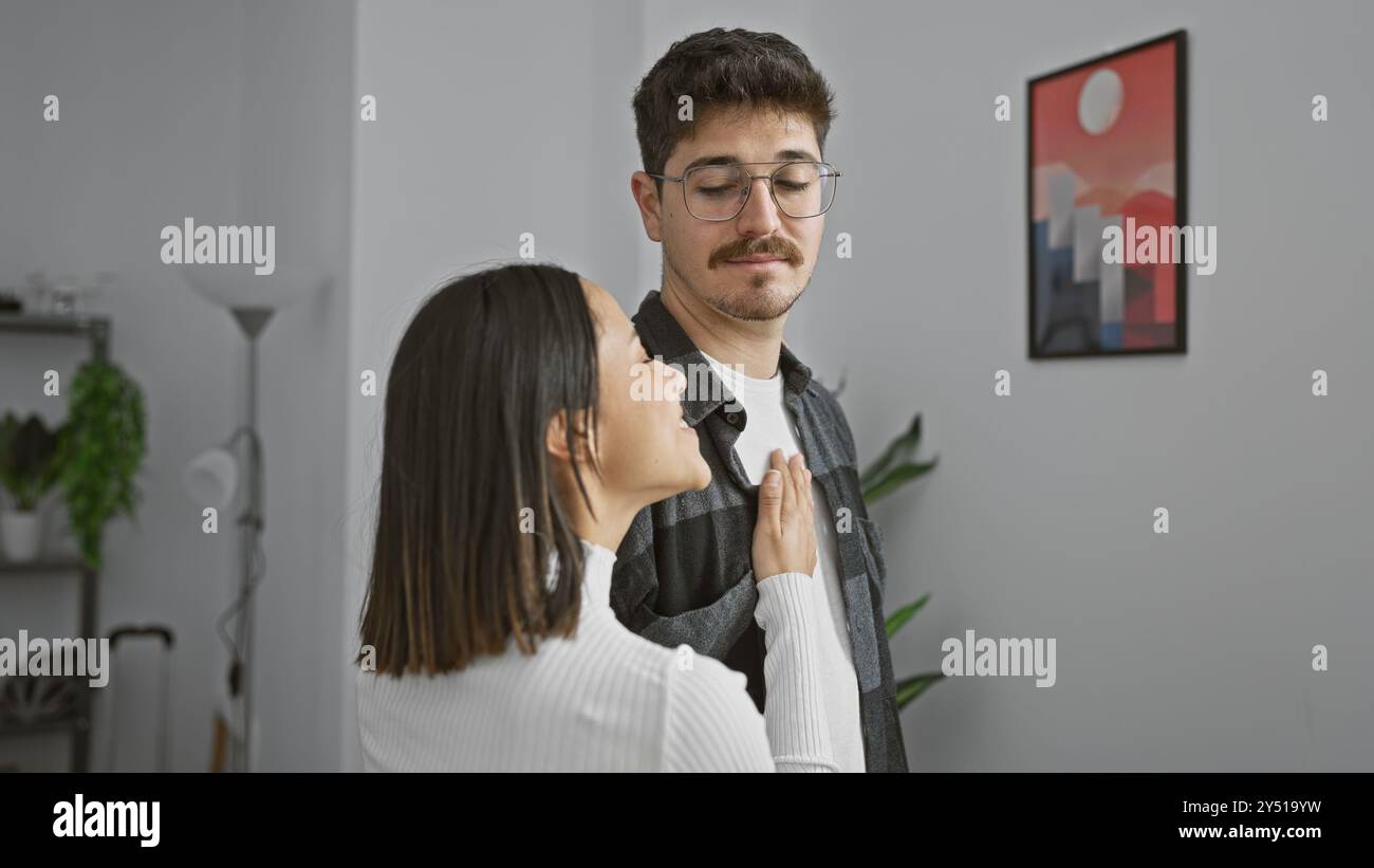 Woman touching mans chest hi-res stock photography and images - Alamy