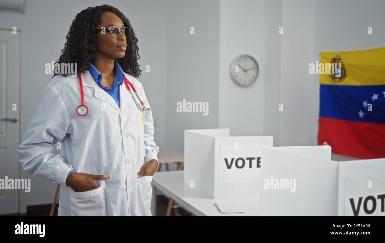 A young african american woman in a lab coat and stethoscope stands in ...