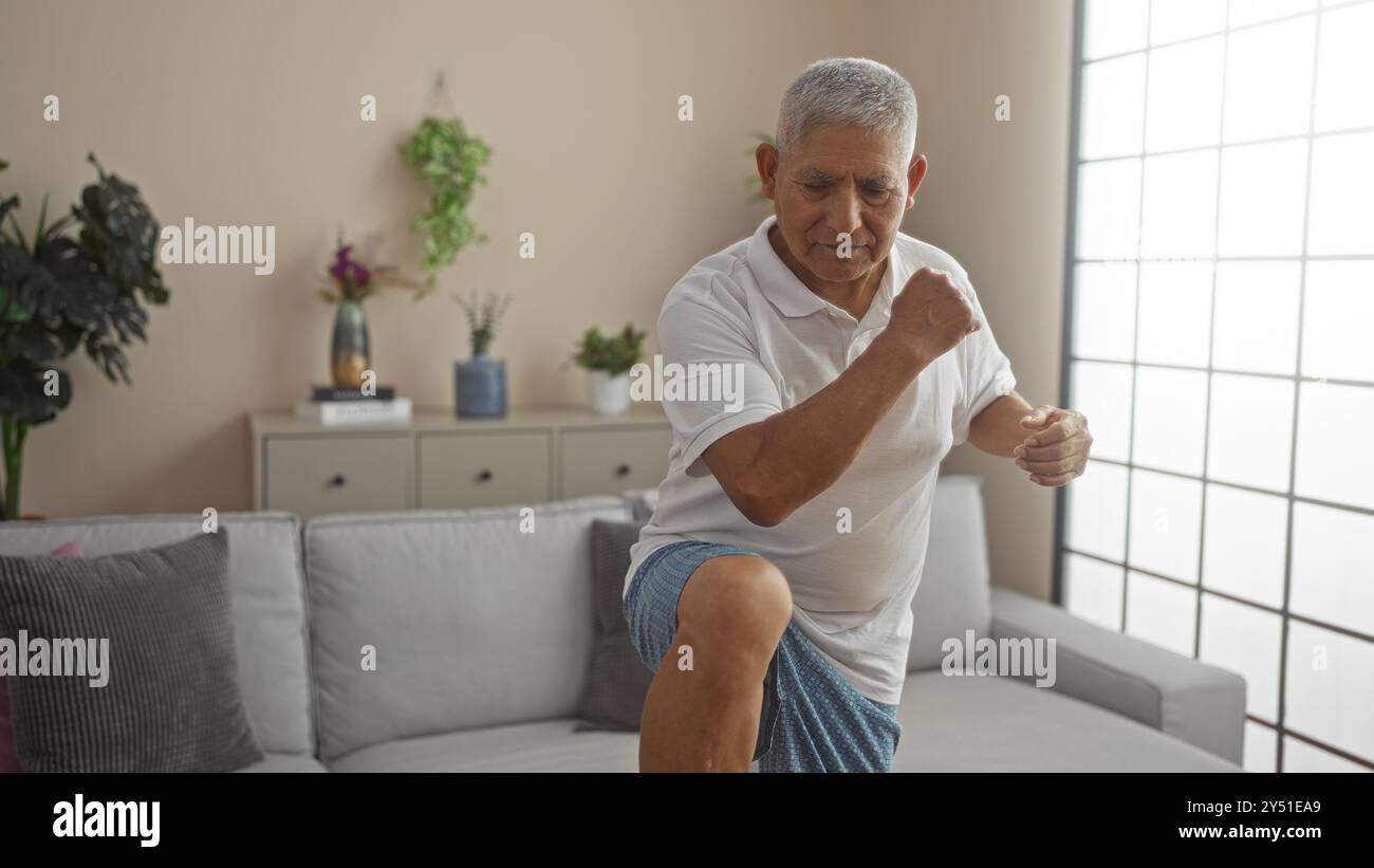 Grey haired hispanic man doing hi-res stock photography and images - Alamy