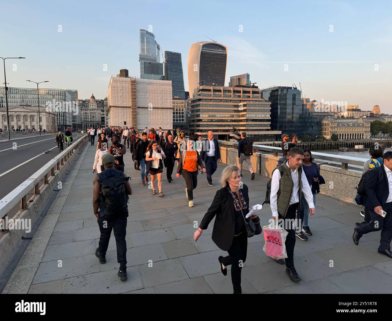 People walking over London Bridge on a warm mid September day Stock ...