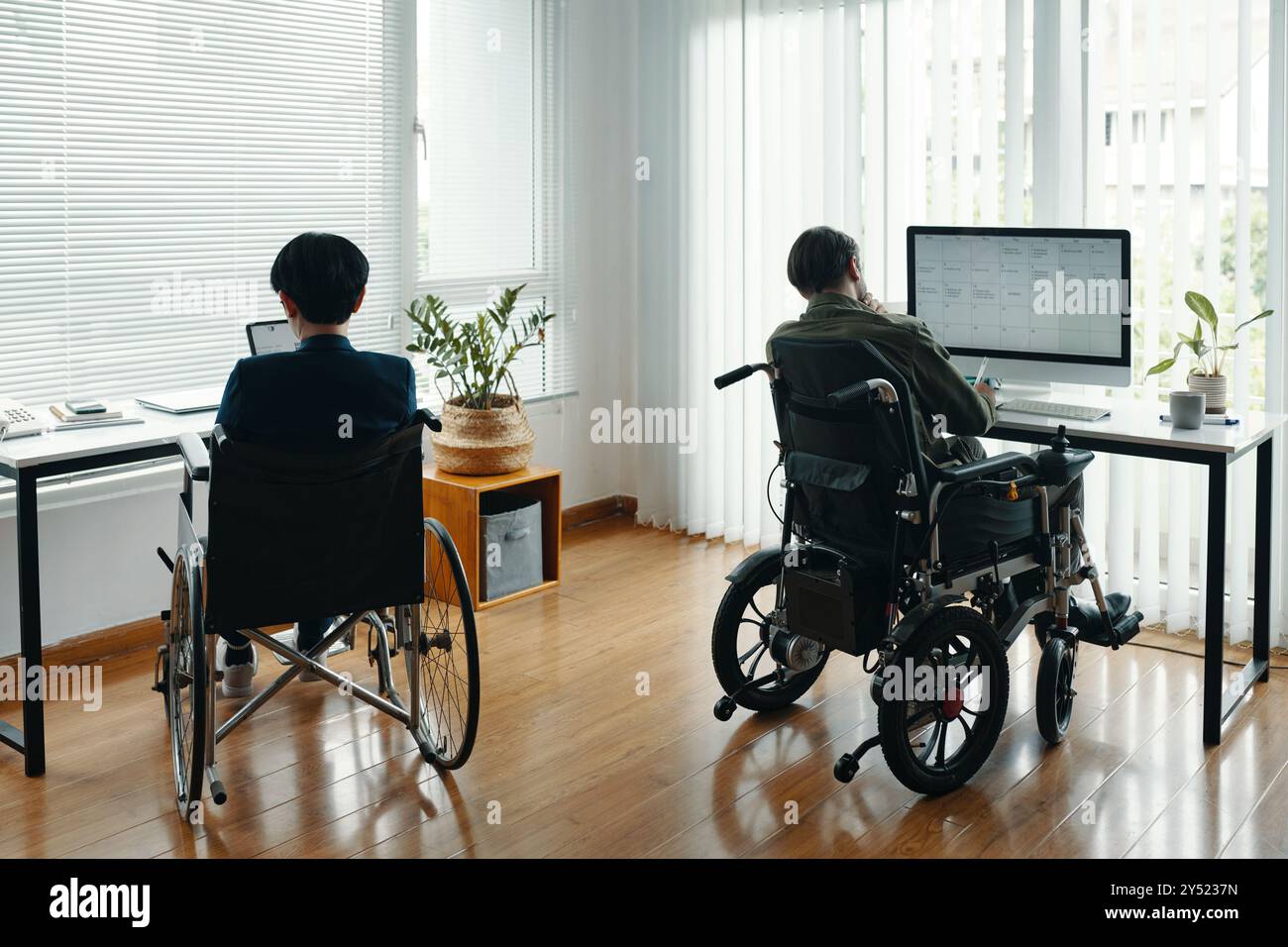 Business People With Disability Working In Office Stock Photo - Alamy