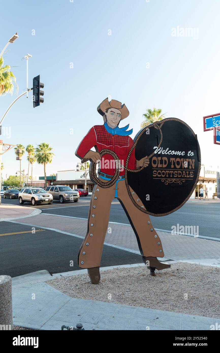 Old Town Scottsdale cowboy sign vertical Stock Photo - Alamy
