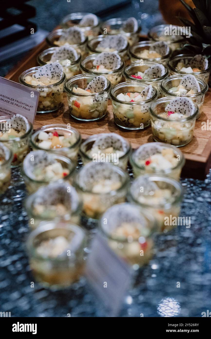 Mini fruit salads with dragon fruit displayed on a dessert buffet Stock ...