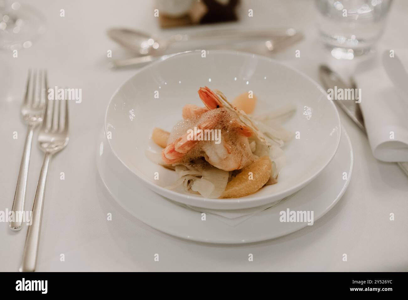 Elegant shrimp and fish dish served in a fine dining setting Stock ...