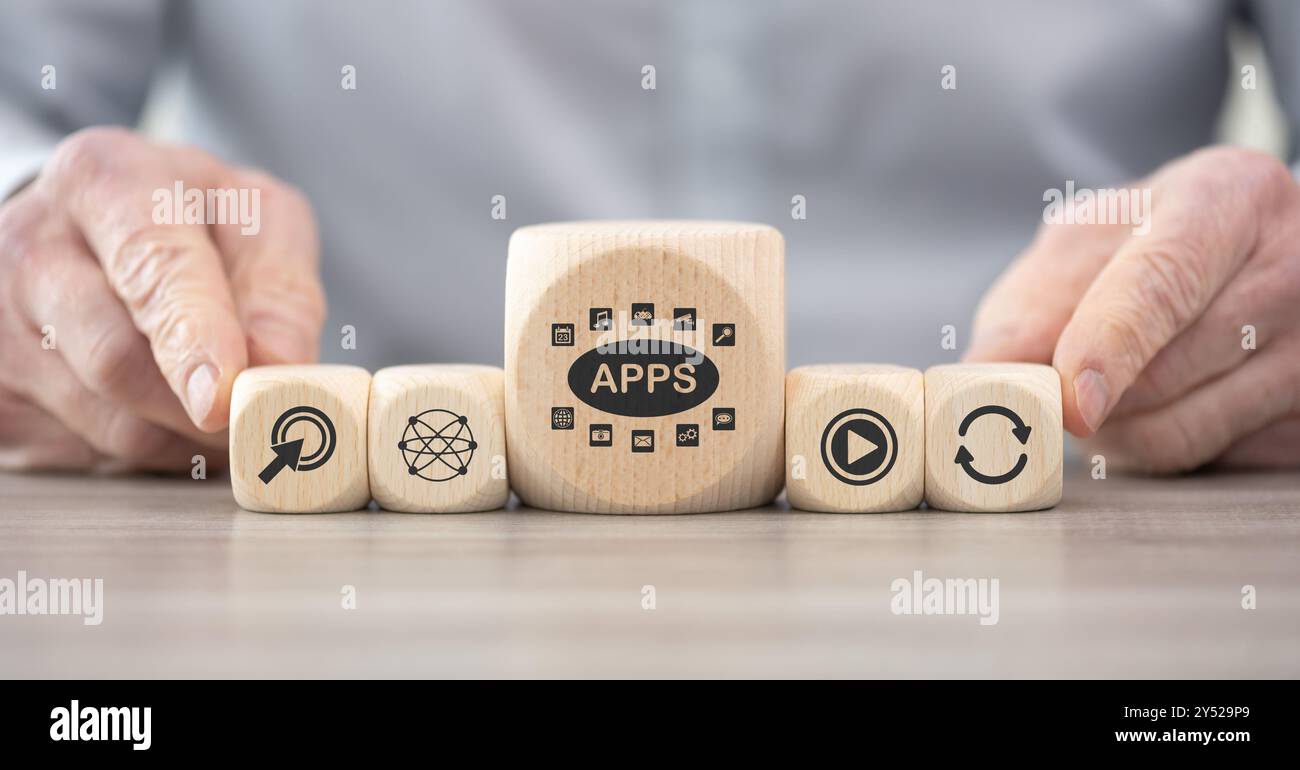 Wooden blocks with symbol of apps concept Stock Photo - Alamy