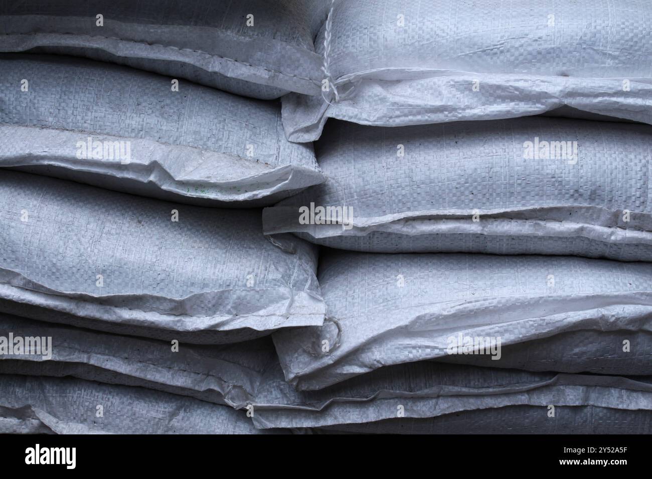 Pile of sacks for background design Stock Photo - Alamy