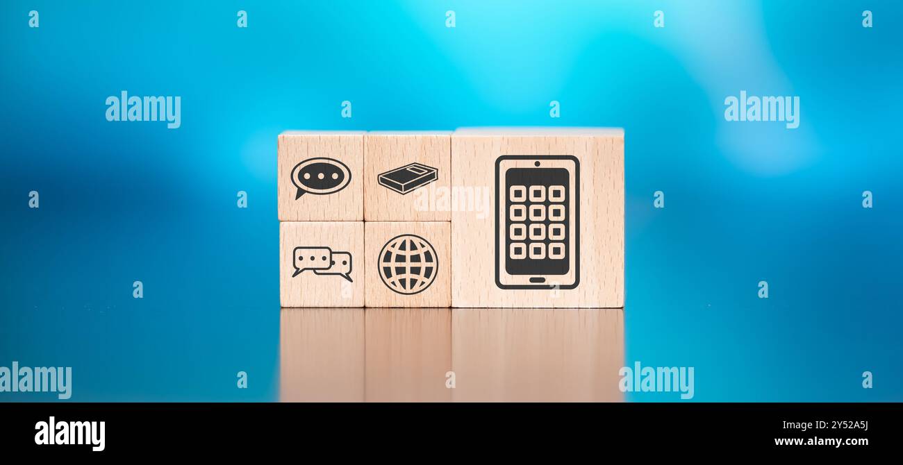 Wooden blocks with symbol of apps concept on blue background Stock ...