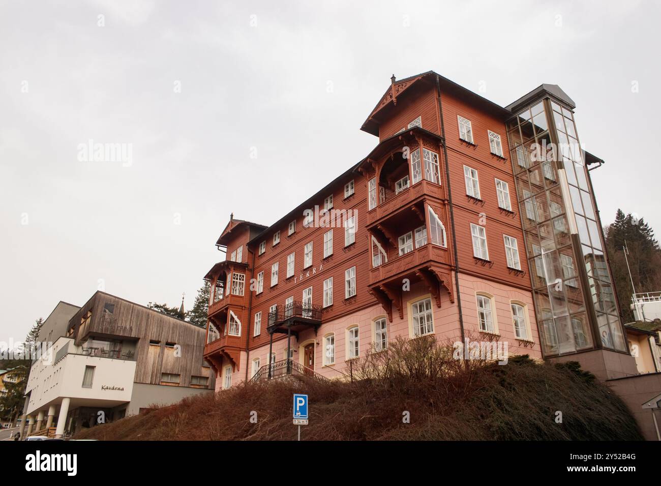 Traditional wooden hotel Terra building standing on a hillside Stock ...