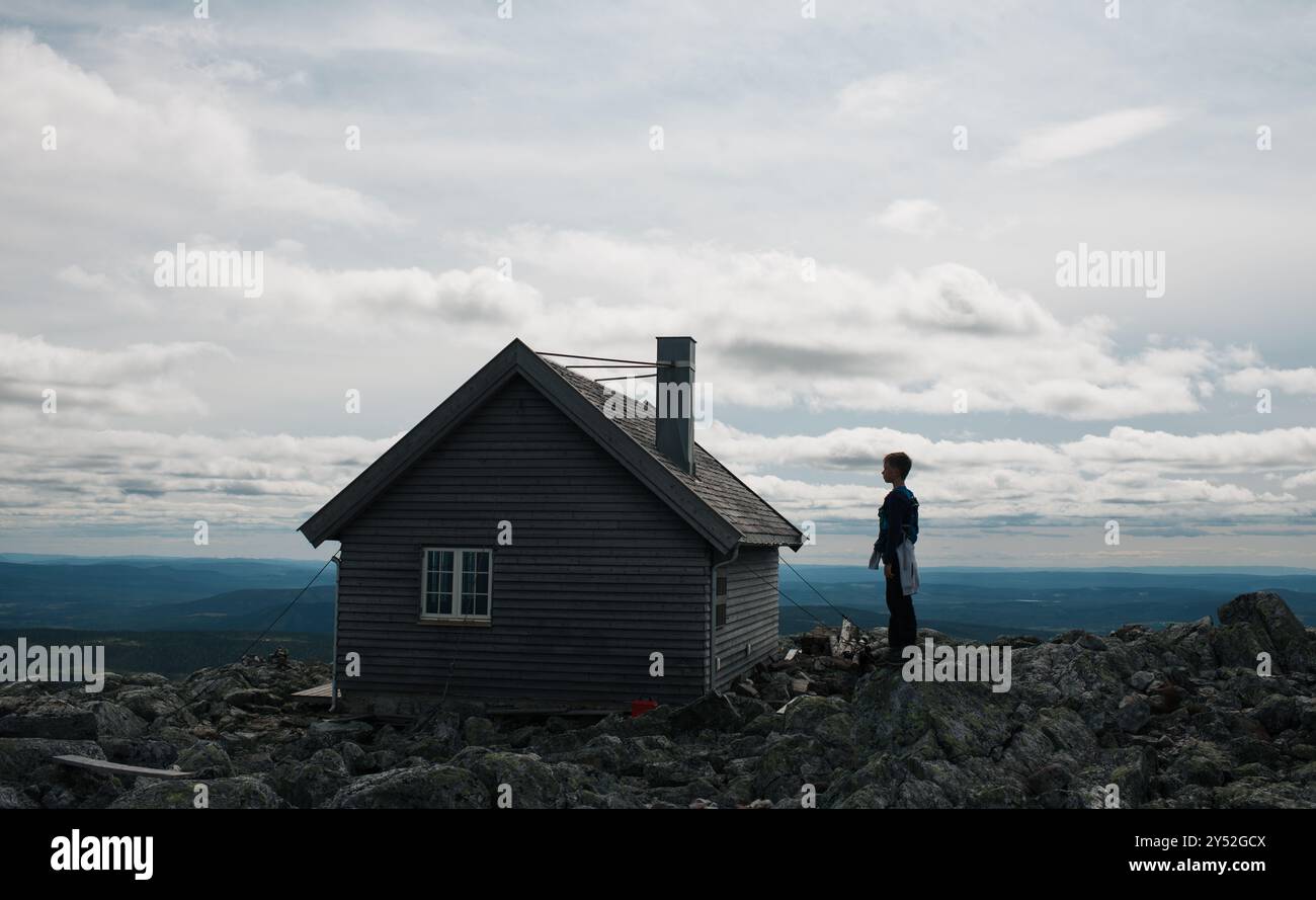 Boy building a hut in the forest hi-res stock photography and images ...