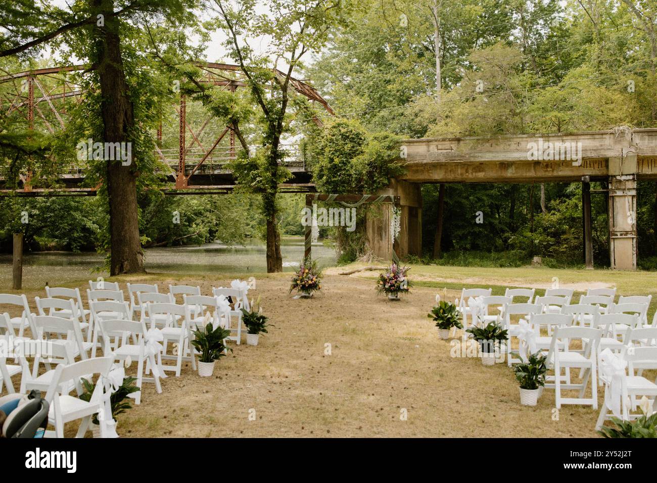 Rustic riverside outdoor wedding ceremony setup Stock Photo - Alamy