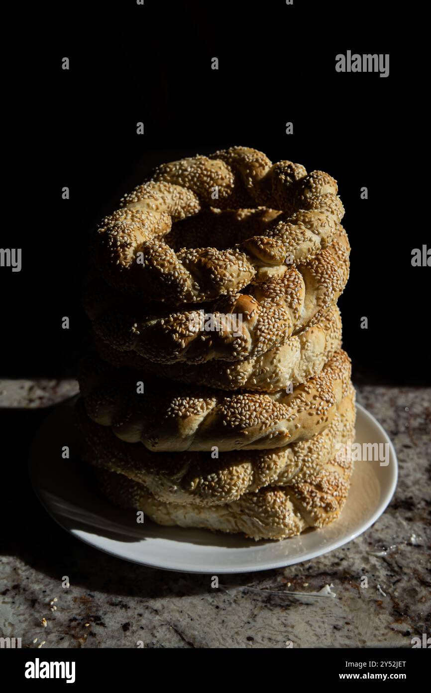 Stacked bread rings with sesame seeds Stock Photo - Alamy