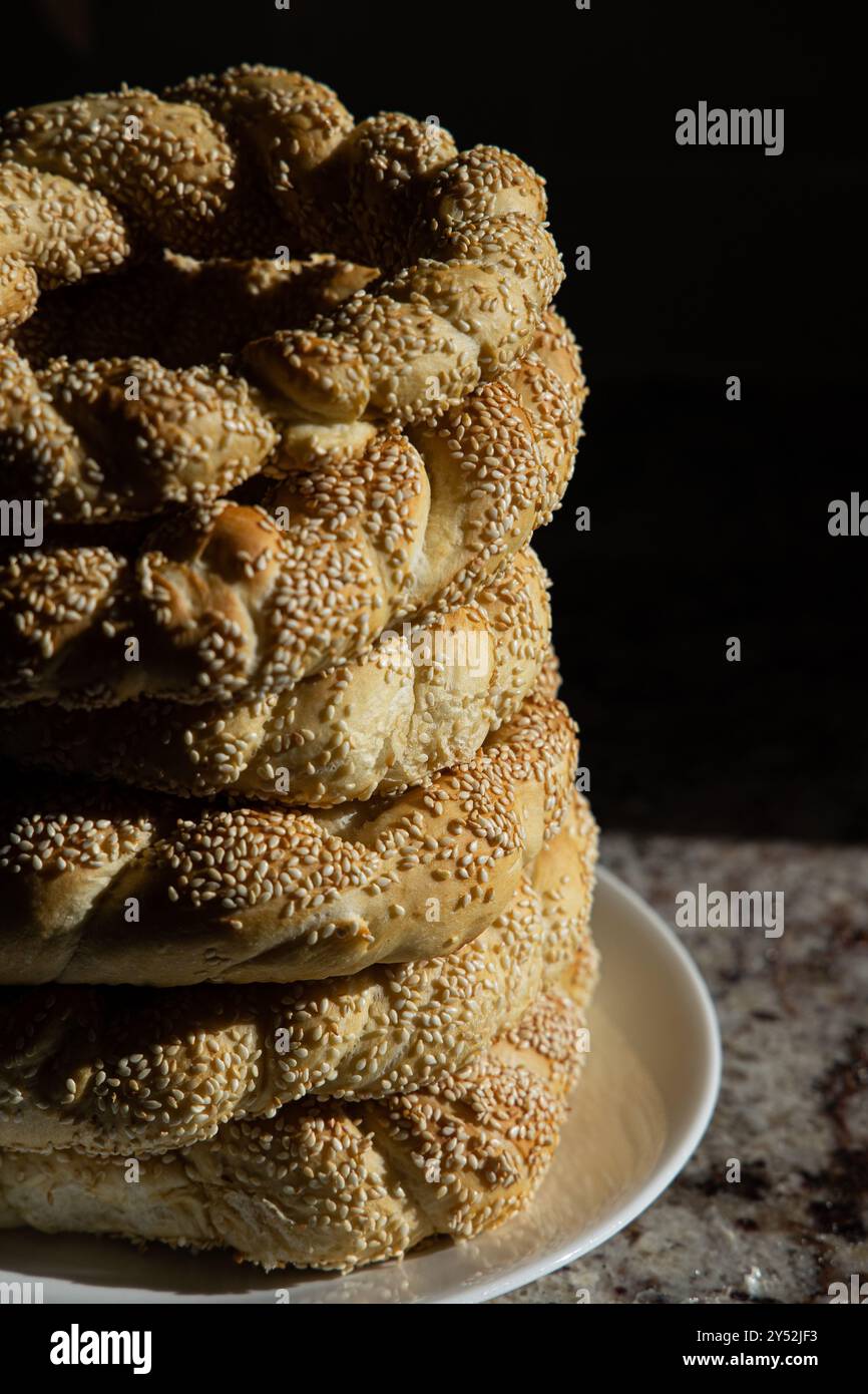 Close up of stacked bread rings with sesame seeds Stock Photo - Alamy