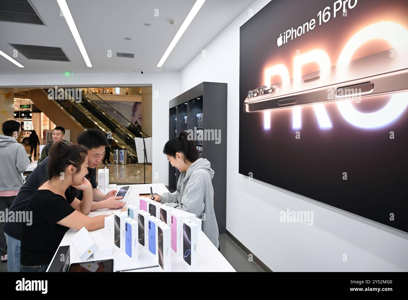 Hohhot,China.20th September 2024.Customers buy Apple products, Hohhot, Inner Mongolia Autonomous ...