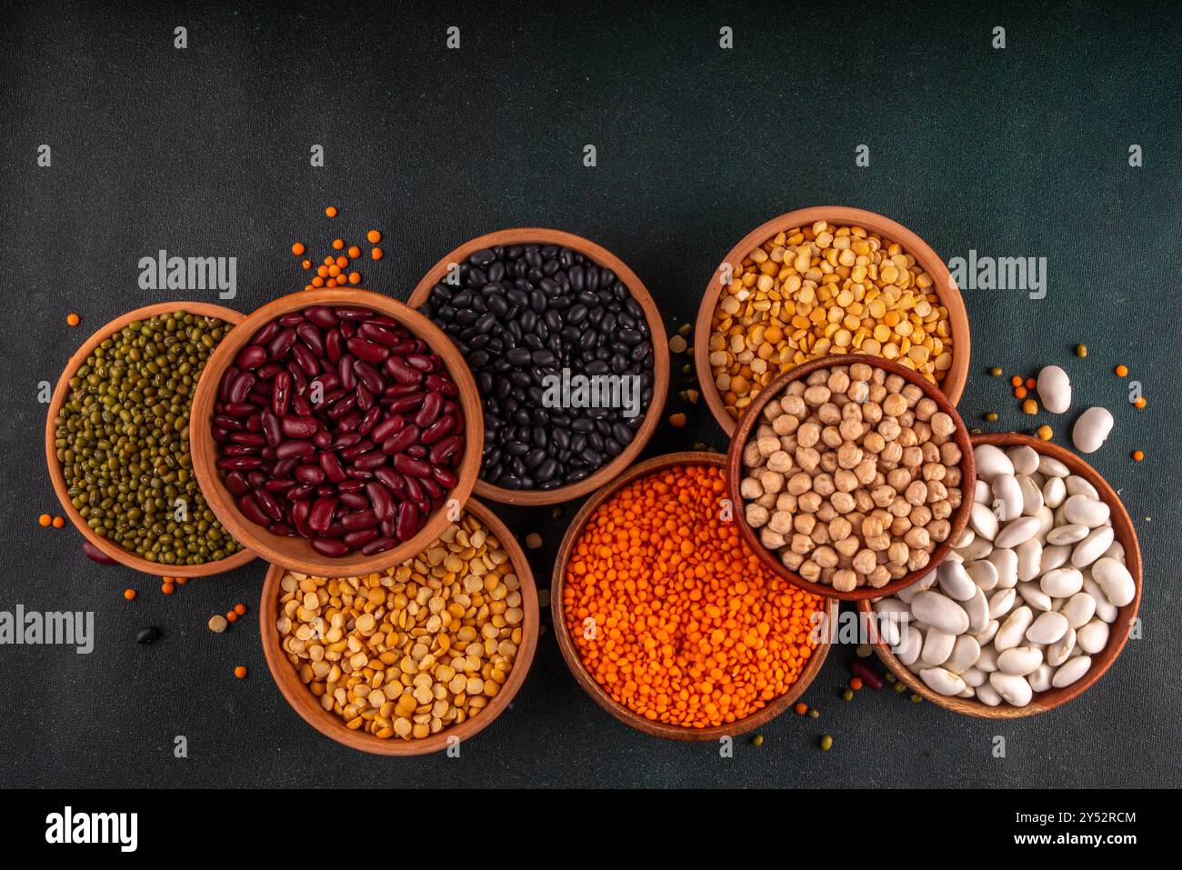 Various dried beans, lentils, mung, chickpea, pea assortment in wooden ...